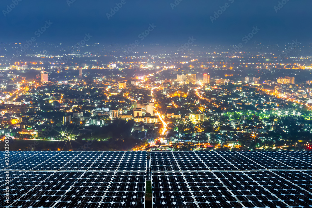 Solar panel or Photovoltaic modules solar power plant with cityscape ...