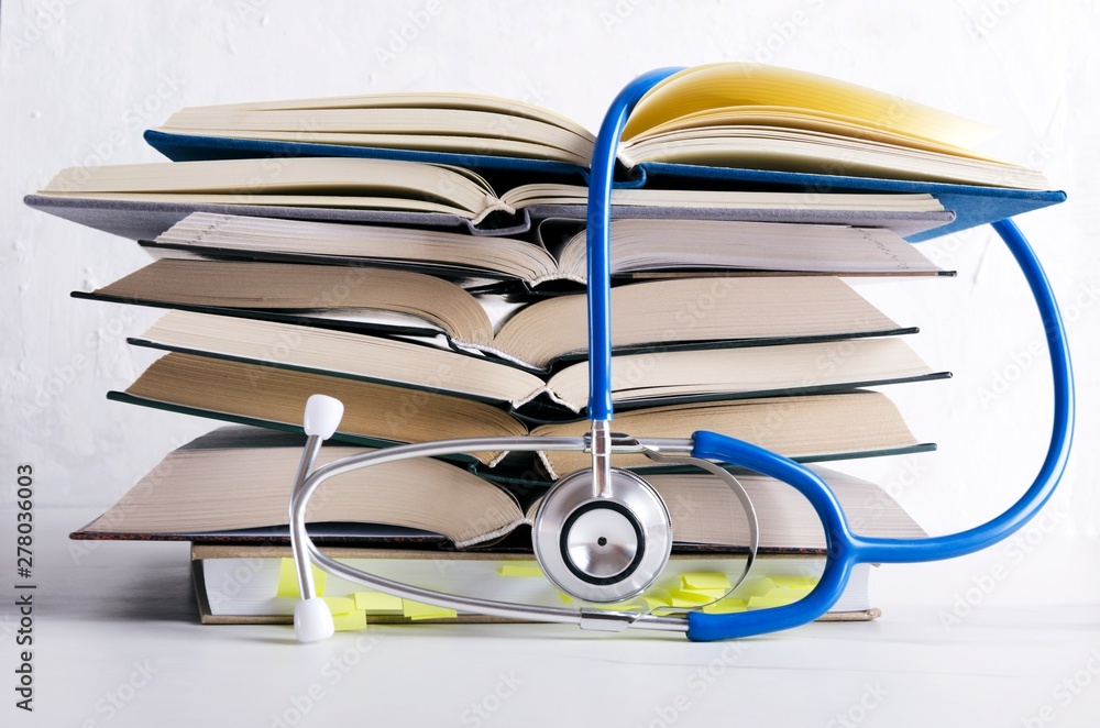 Medical knowledge. Pile of open books for medical student Stock Photo ...