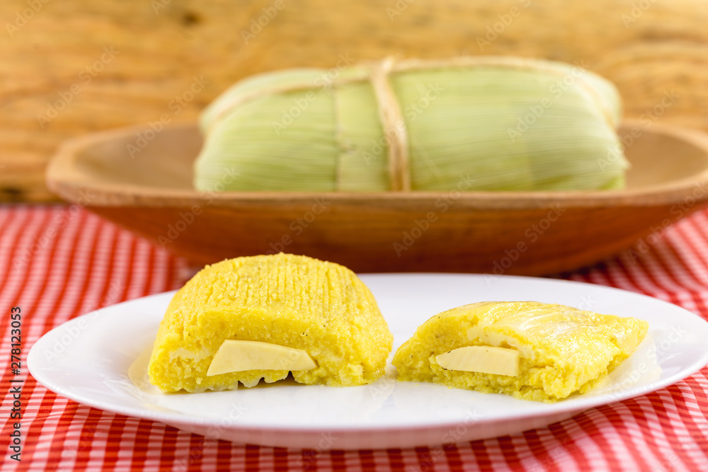 Pamonha, Brazilian sweet corn with cheese filling. Pamonha typical of ...