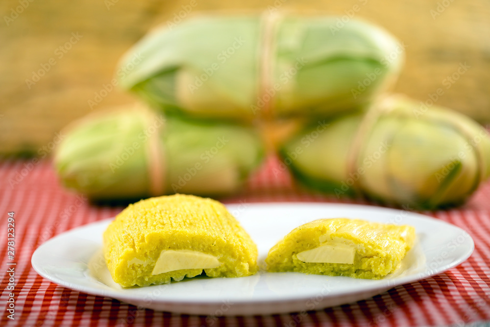 Pamonha, Brazilian sweet corn with cheese filling. Pamonha typical of ...
