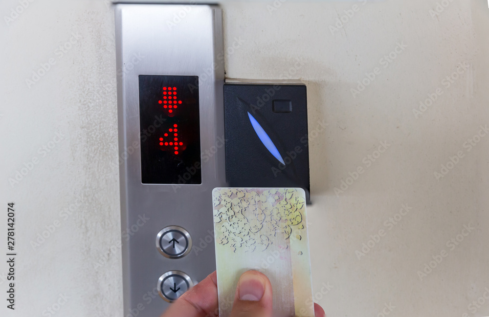 securing lift or elevator access control. elevator access control, Hand ...