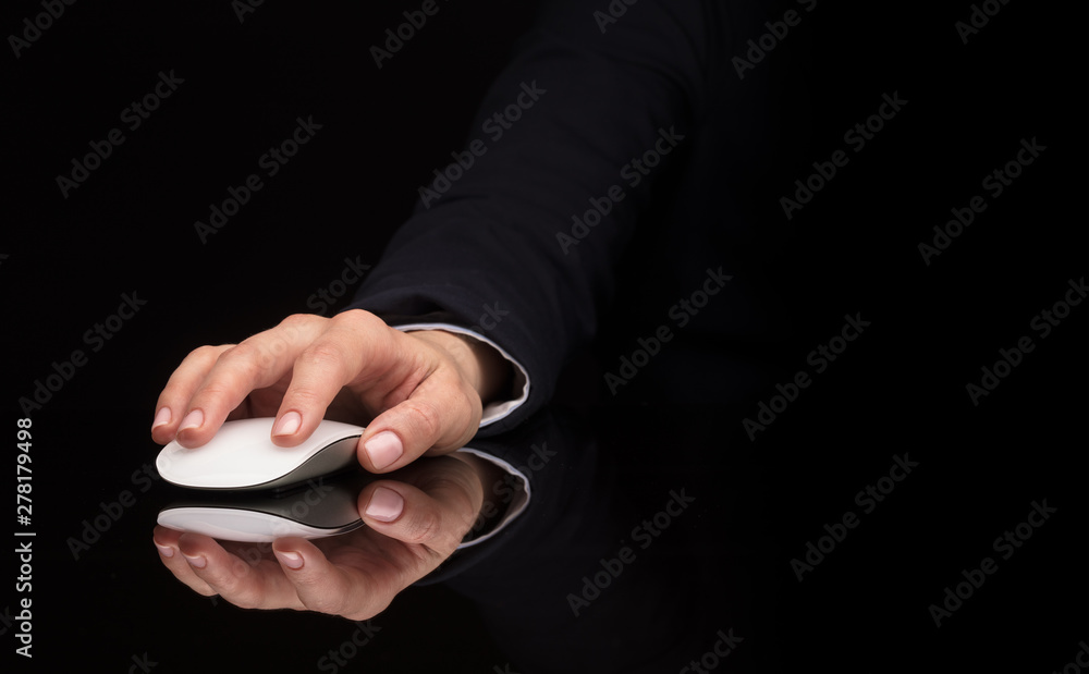 Hand using wireless mouse in a dark environment Stock Photo | Adobe Stock