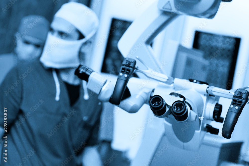 surgical microscope on the background of modern neurosurgical operating ...