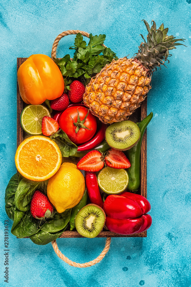 Fruits and vegetables rich in vitamin C in box. Stock Photo | Adobe Stock