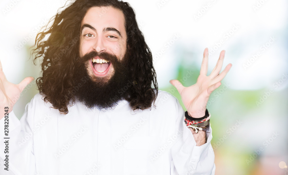 Man wearing Jesus Christ costume celebrating crazy and amazed for ...