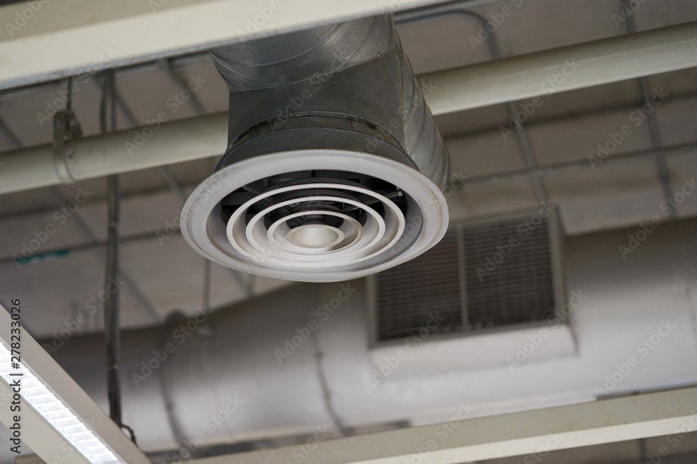 Air conditioner opening drainage on loft style ceiling Stock Photo ...