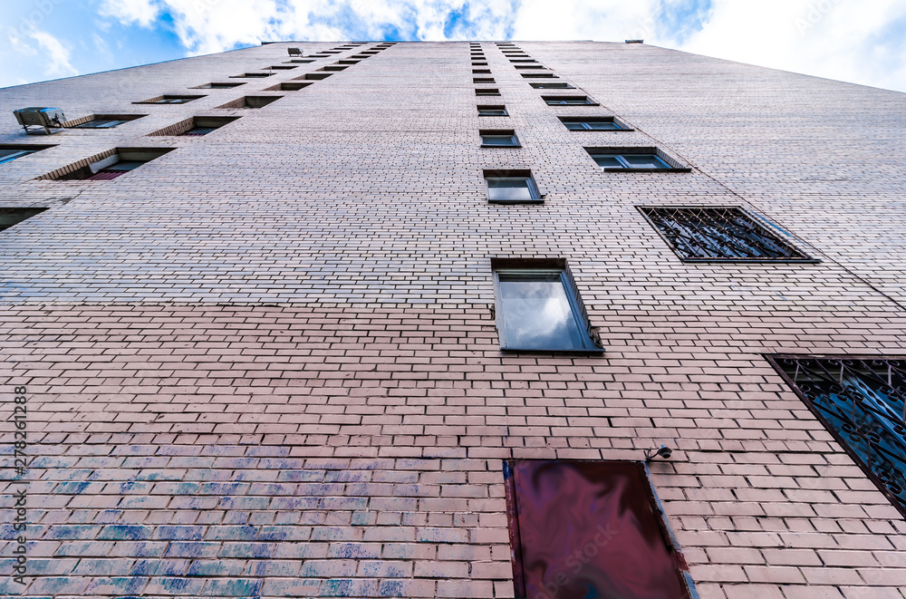 Perspective of brick tall building of residential flats and apartments ...