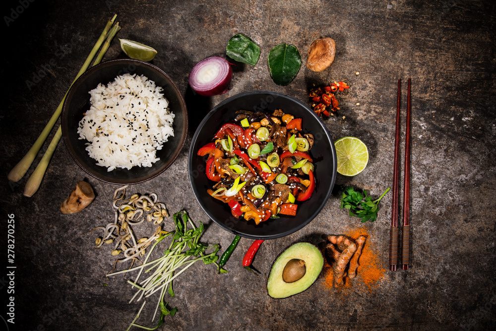 Szechuan beef asian food background with various ingredients on rustic ...