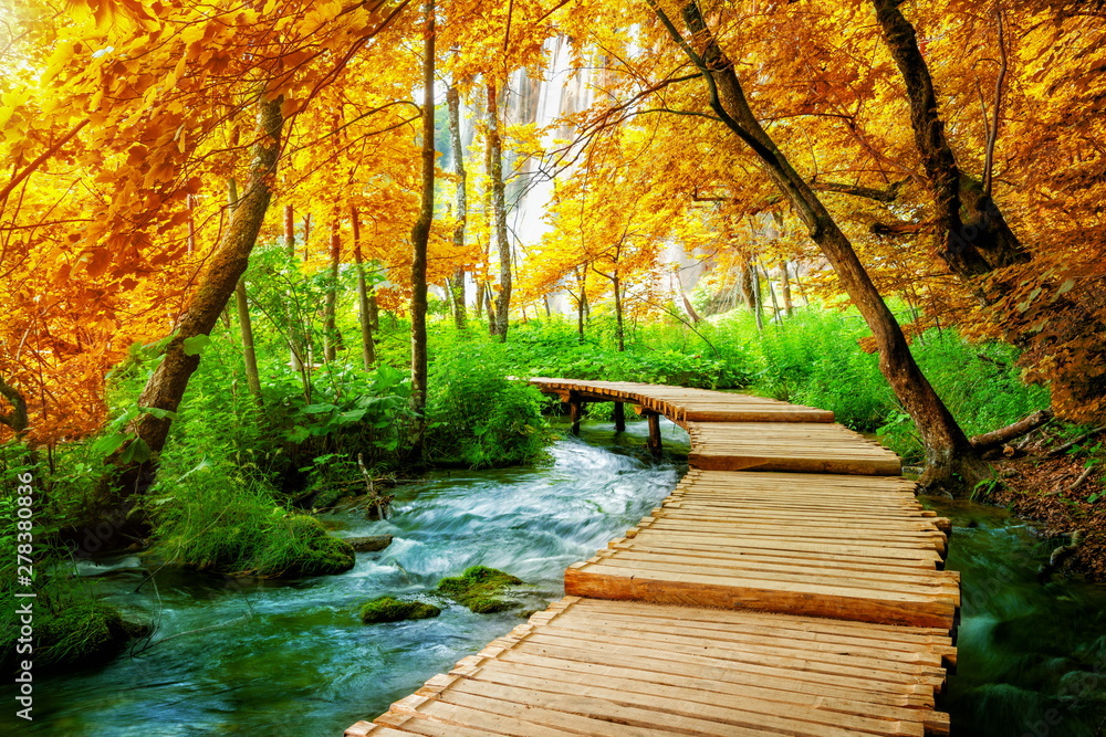 Beautiful wooden path trail for nature trekking with lakes and ...