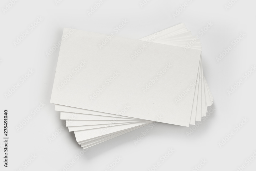 Mockup of business cards stack at white textured background. Design ...