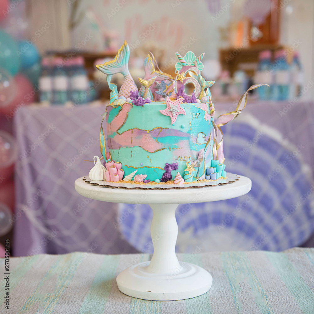 Mermaid Candy Bar. Delicious sweet buffet with cake. A beautiful cake ...