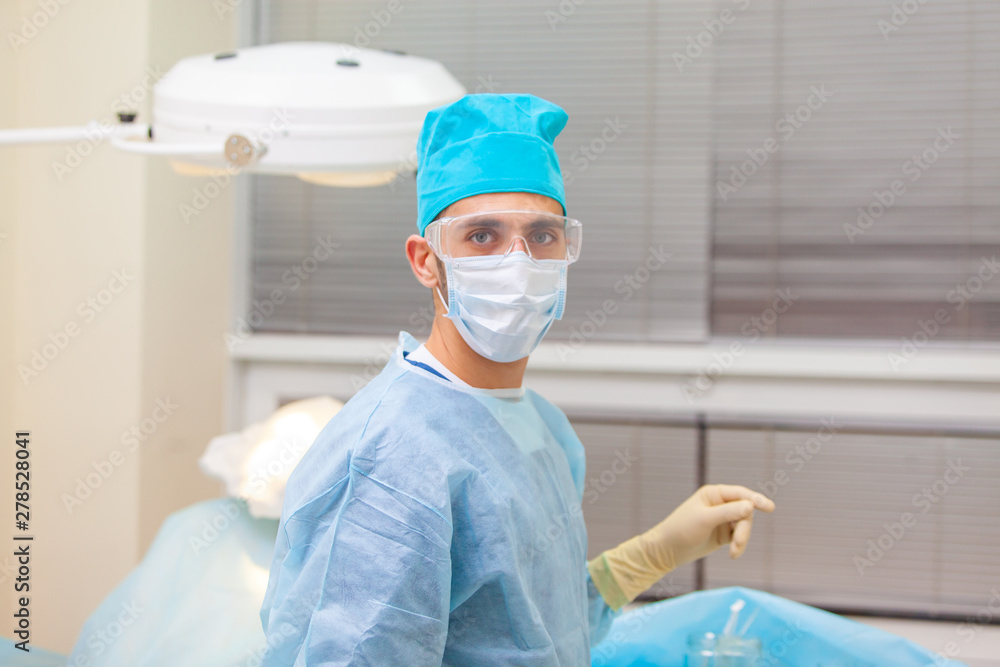 Portrait of surgeon. Baldness treatment. Hair transplant. Surgeons in ...