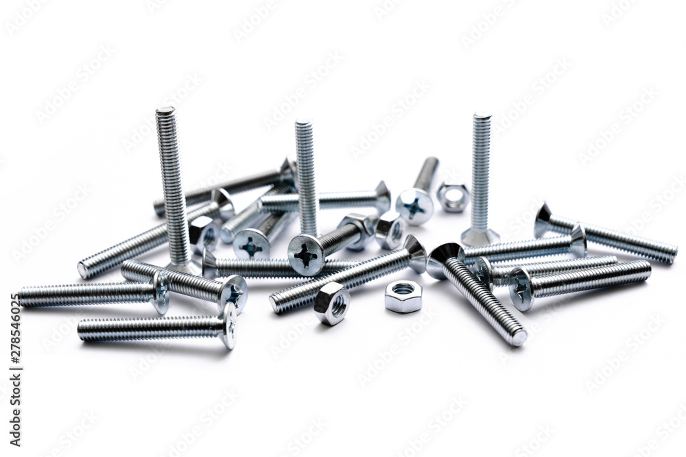 Top view of stainless steel bolts or iron nails on brigth white ...