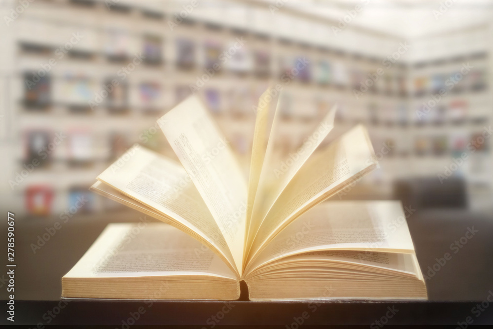 Education learning concept with opening book or textbook in modern ...