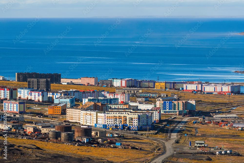 Top view of a small port city on the coast of the East Siberian Sea of ...