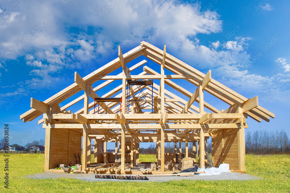 Construction house under the clouds. Construction site. House from ...