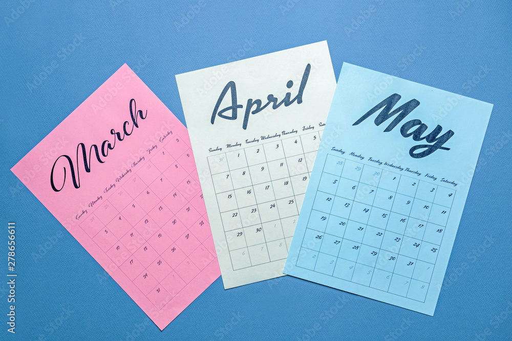 Sheets of paper calendar with spring months on color background Stock ...