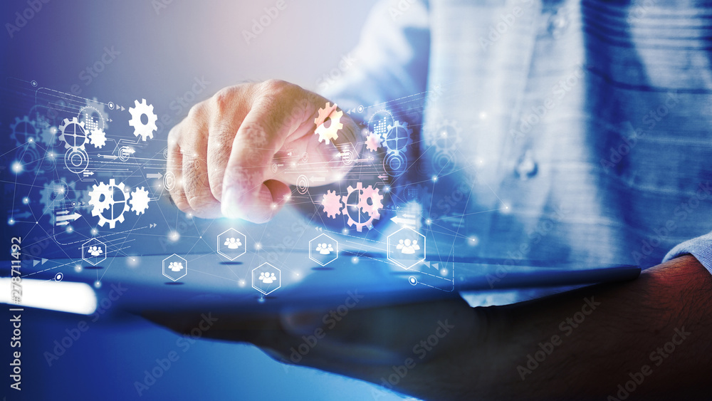 Foto de hand holding network with icons interface on screen, Social ...