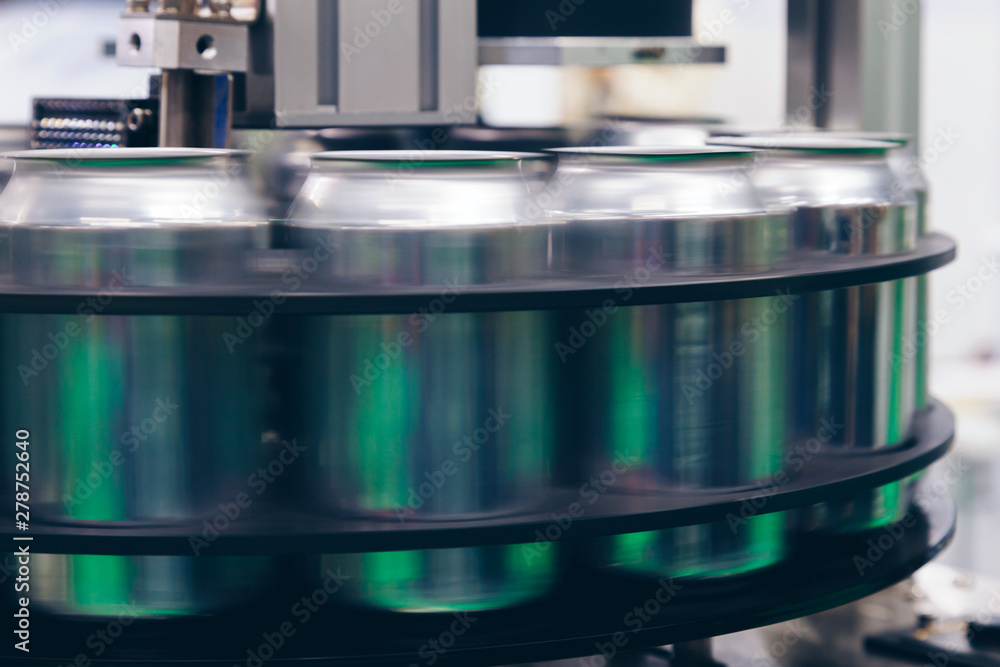 empty new aluminum cans for drink process are moving in factory line on ...