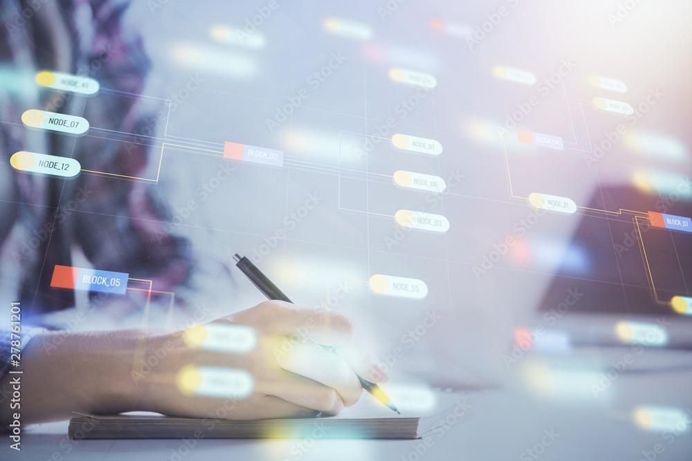 Double exposure of woman's writing hand on background with data ...