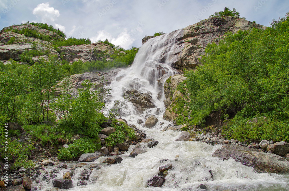 Dombay. Alibek Fall. Waterfall formed by falling of river from Alibek ...
