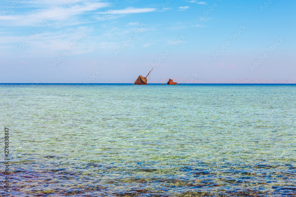 Red Sea coast, reef and wrecked ship in the Nabq National Park. Famous ...