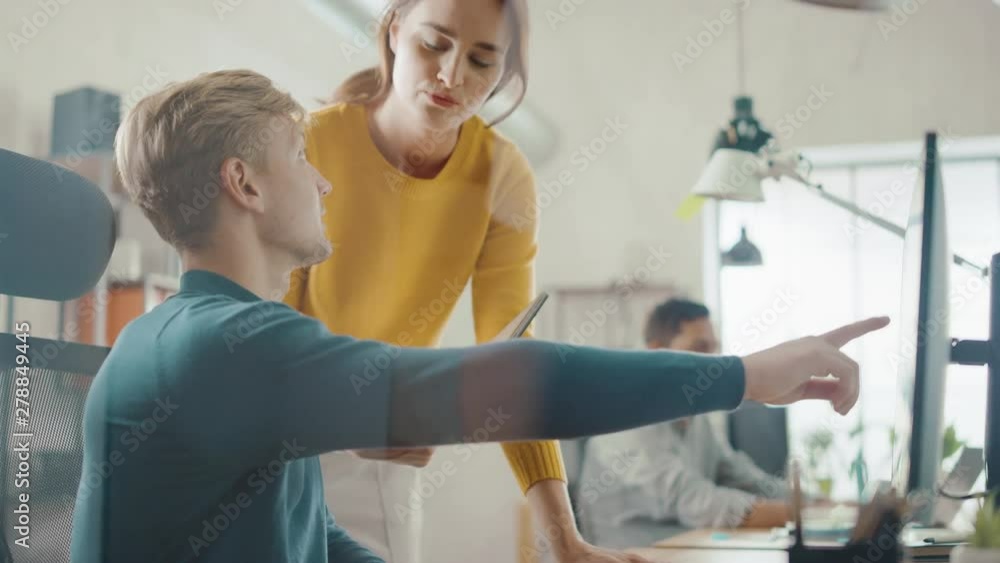 Handsome Professional Sitting at His Desk Working on Laptop Computer ...