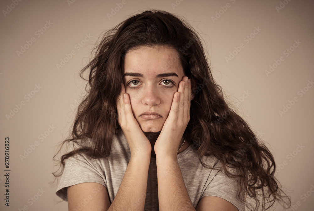 Close up portrait of teenager female suffering depression. Sad face ...