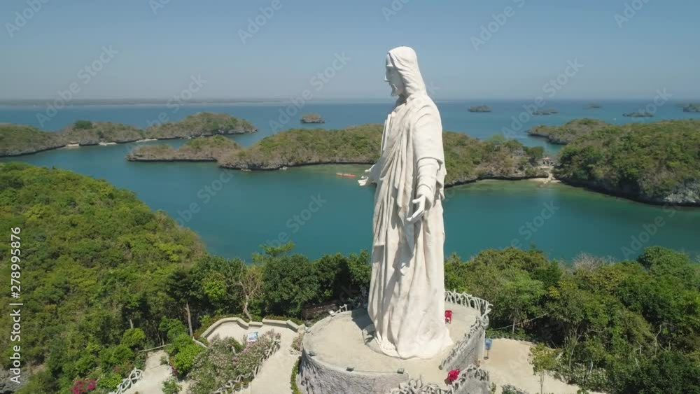 Statue of Jesus Christ on Pilgrimage island in Hundred Islands National ...