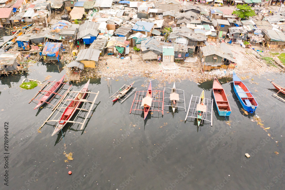 Houses and boats of the poor inhabitants of Manila. Dwelling poor in ...