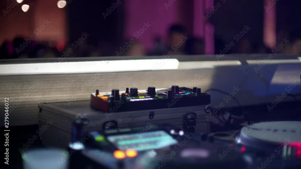 Vidéo Stock DJ Table with a multiple colourful lights, buttons, screen ...
