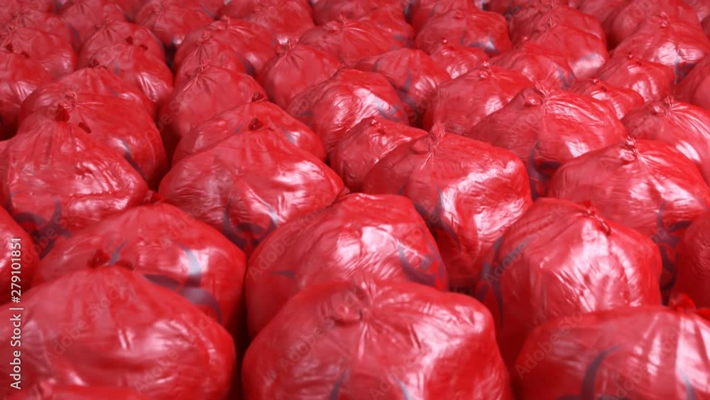 Seamless looping animation of biohazard trash in bright red plastic ...