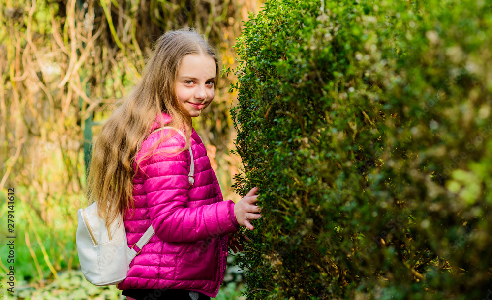 Enjoying nature. Kid cute fancy child spend time in park. Explore ...