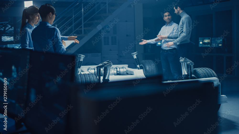 Automobile Engineers Working on Electric Car Chassis Platform, Using ...