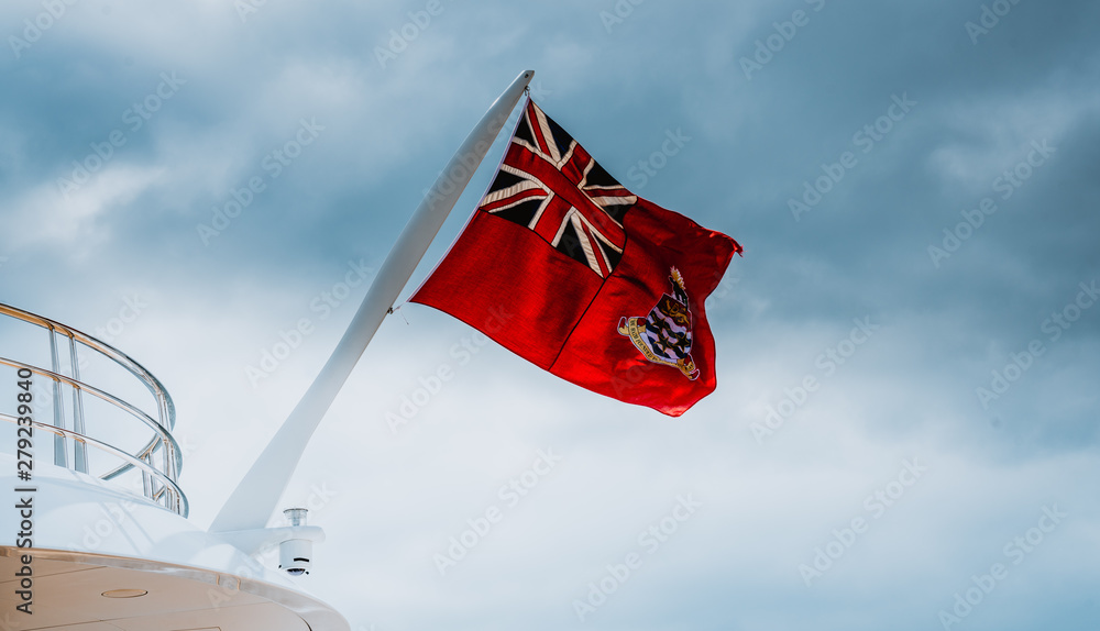 Kajmany czerwona flaga flaga Kajmanów Stock Photo | Adobe Stock