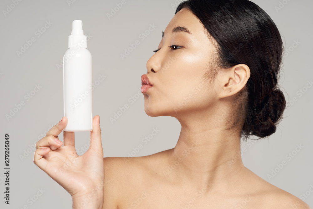 woman with bottle Stock Photo | Adobe Stock