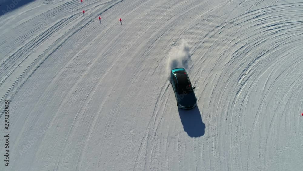 Cinematic Aerial of Car Testing Engine and Tyres in Winter Conditions ...
