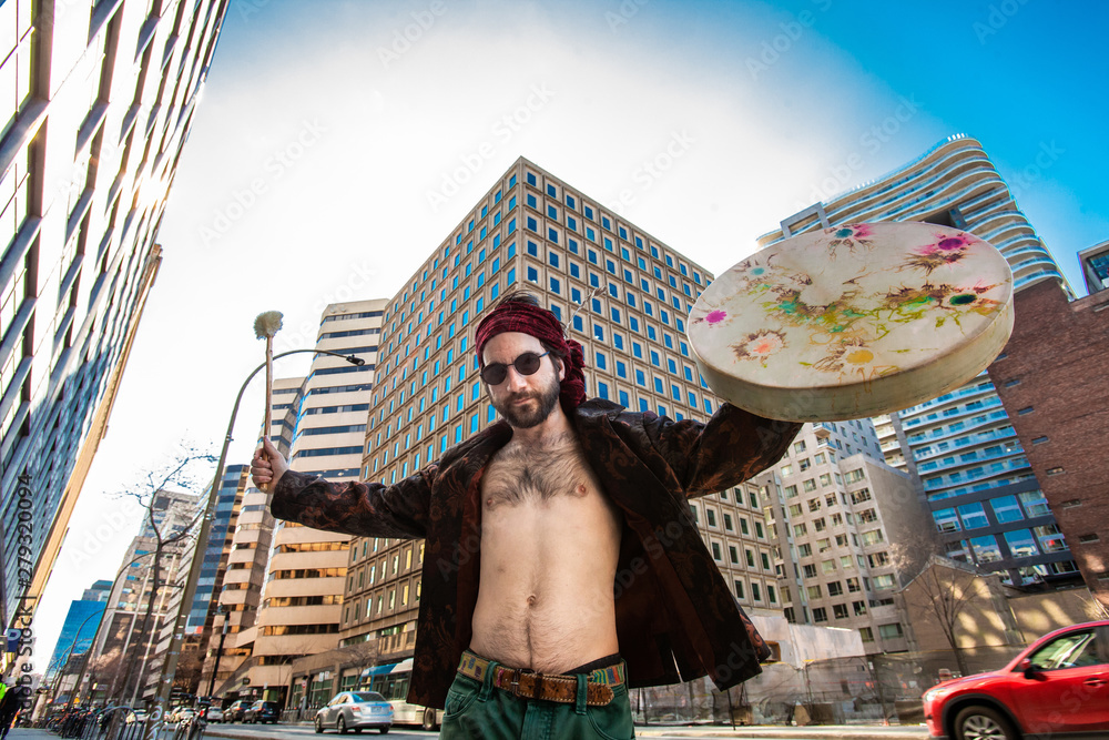 Sacred musician seeks urban inspiration. A front portrait view of a ...