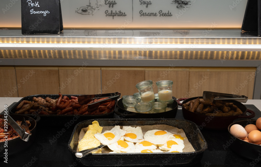 Selection of self service catering continental breakfast buffet display ...