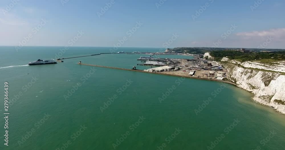 Aerial view of port of Dover with a ship entering harbour, busy car and ...