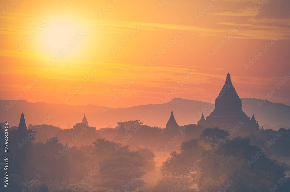 Amazing sunset colors and silhouettes of ancient Buddhist Temples at ...