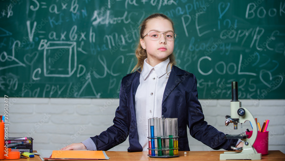 Research and development. Little girl in school lab. biology education ...