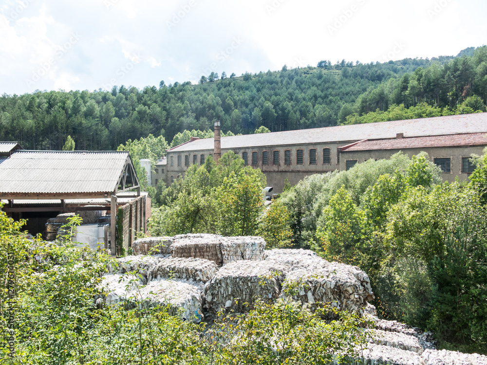Recycled paper factory. Bales of cardboard, boxes and papers prepared ...