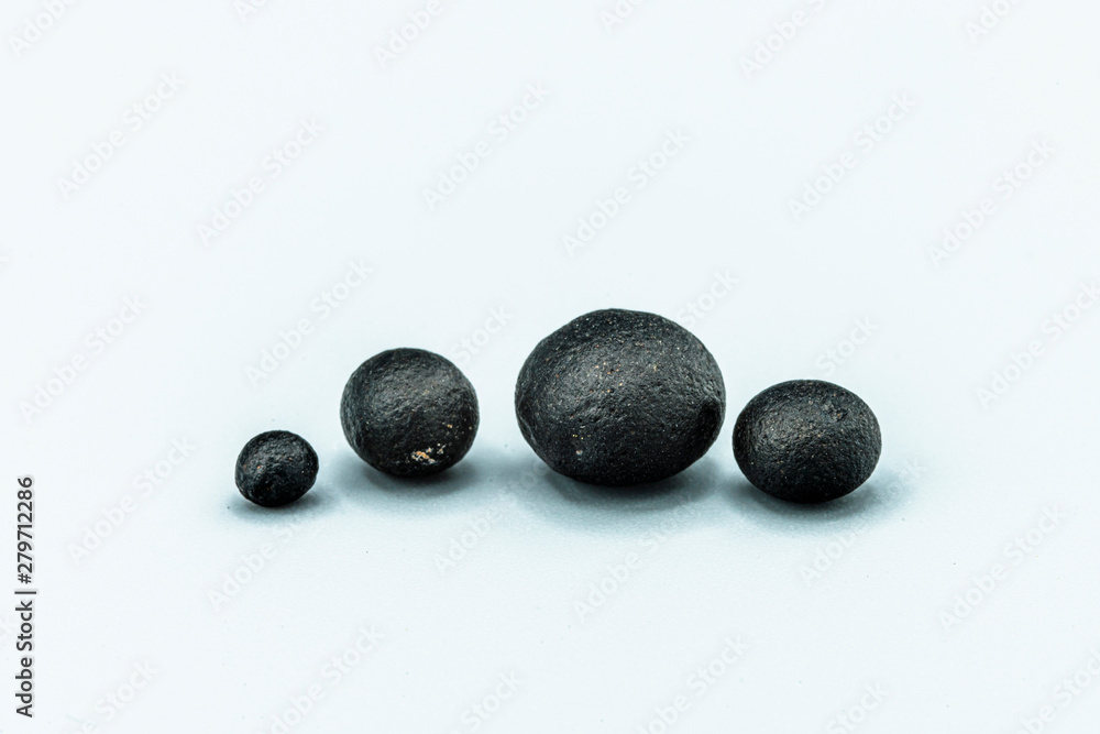 Black magnetic Tektite Meteorite isolated, piece of rock formed in big ...