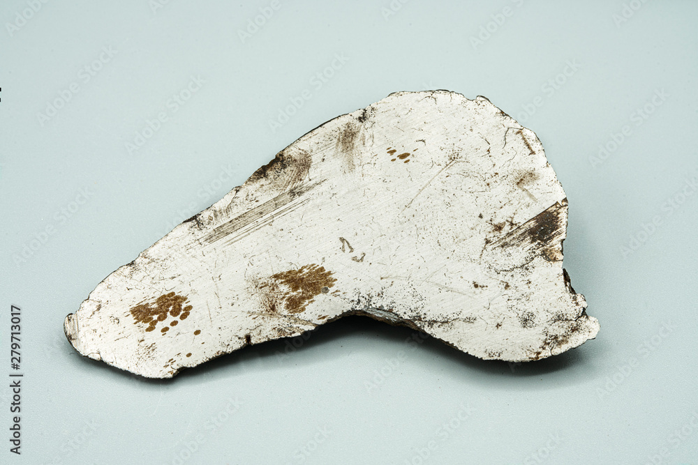 Foto de Metallic Meteorite cut isolated, piece of rock formed in outer ...