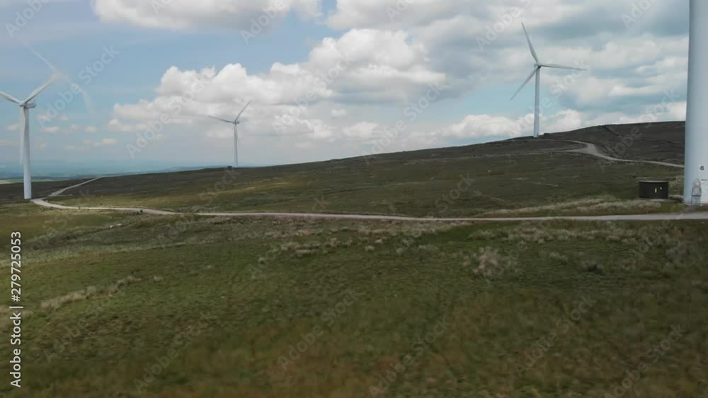 Vidéo Stock A dolly style shot of Wind Turbines on Caton Moor (right to ...