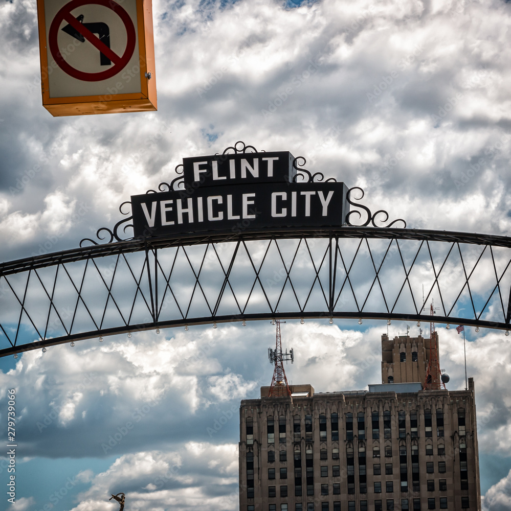 Flint, Michigan downtown gateway sign showing Vehicle City. Known ...