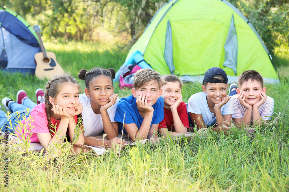 Group of children resting at summer camp Stock Photo | Adobe Stock