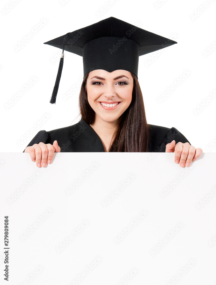 Female graduate student peeking from behind a blank panel, isolated on ...