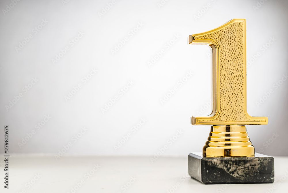 Winners 1st place gold trophy with copy space Stock Photo | Adobe Stock